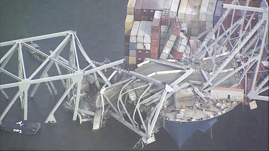 Baltimore bridge collapses after powerless cargo ship rams into support ...