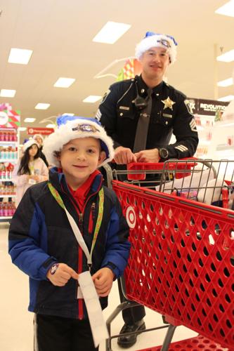 'Shop with a Cop' celebrates 30 years delivering the magic of Christmas ...