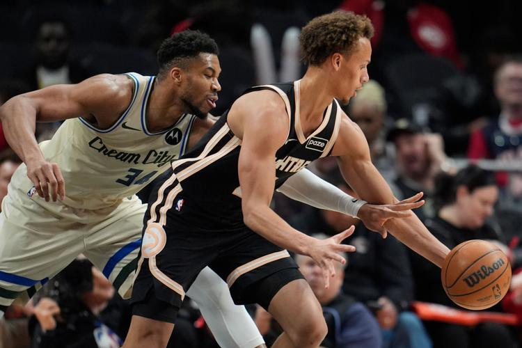 Antetokounmpo and the Bucks hold off Atlanta 112-110 to snap a three ...