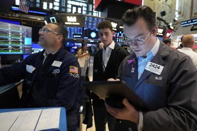 Wall Street nudges toward more records to open shortened week ...