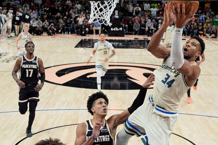 Antetokounmpo and the Bucks hold off Atlanta 112-110 to snap a three ...