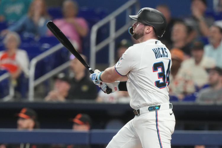 Marlins beat the Orioles 4-3 on a 9th-inning throwing error to avoid ...