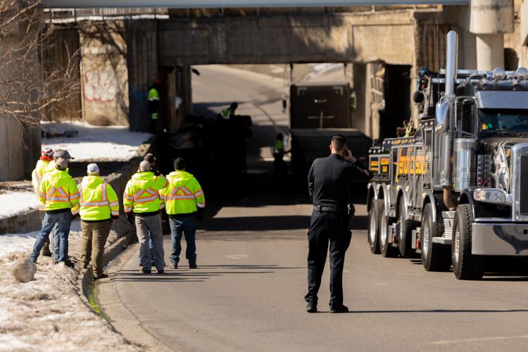 Semi-truck overturns in F Street underpass after colliding with bridge ...