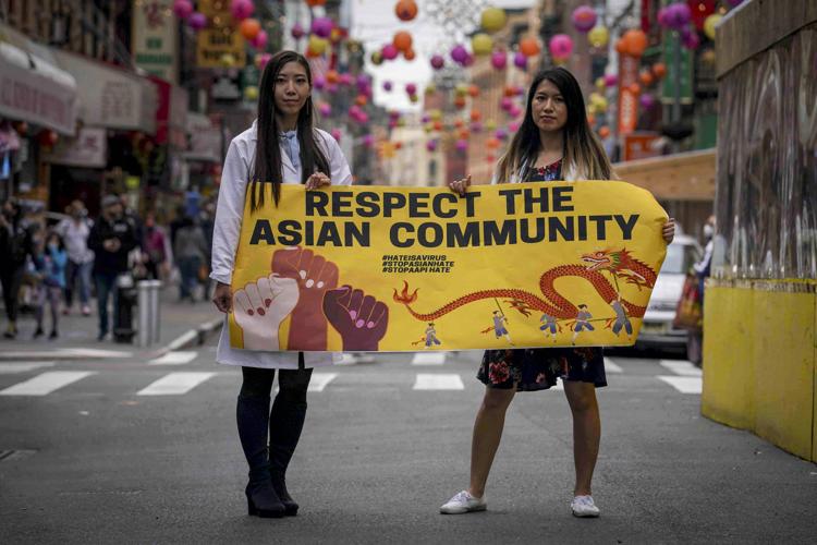 Asian American health workers fight virus and racist attacks | Features ...
