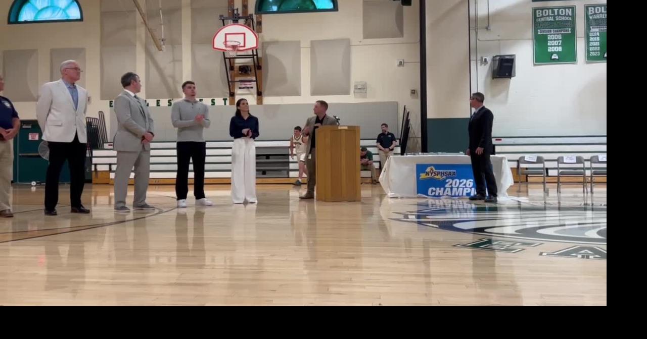 Bolton's Liam Foy and Jace Hubert collect their state championship rings