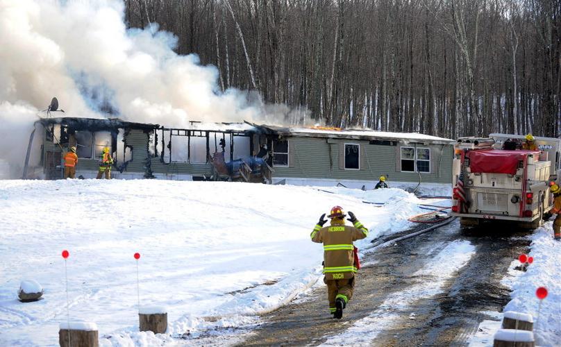Firefighters extinguish fire at Hebron home
