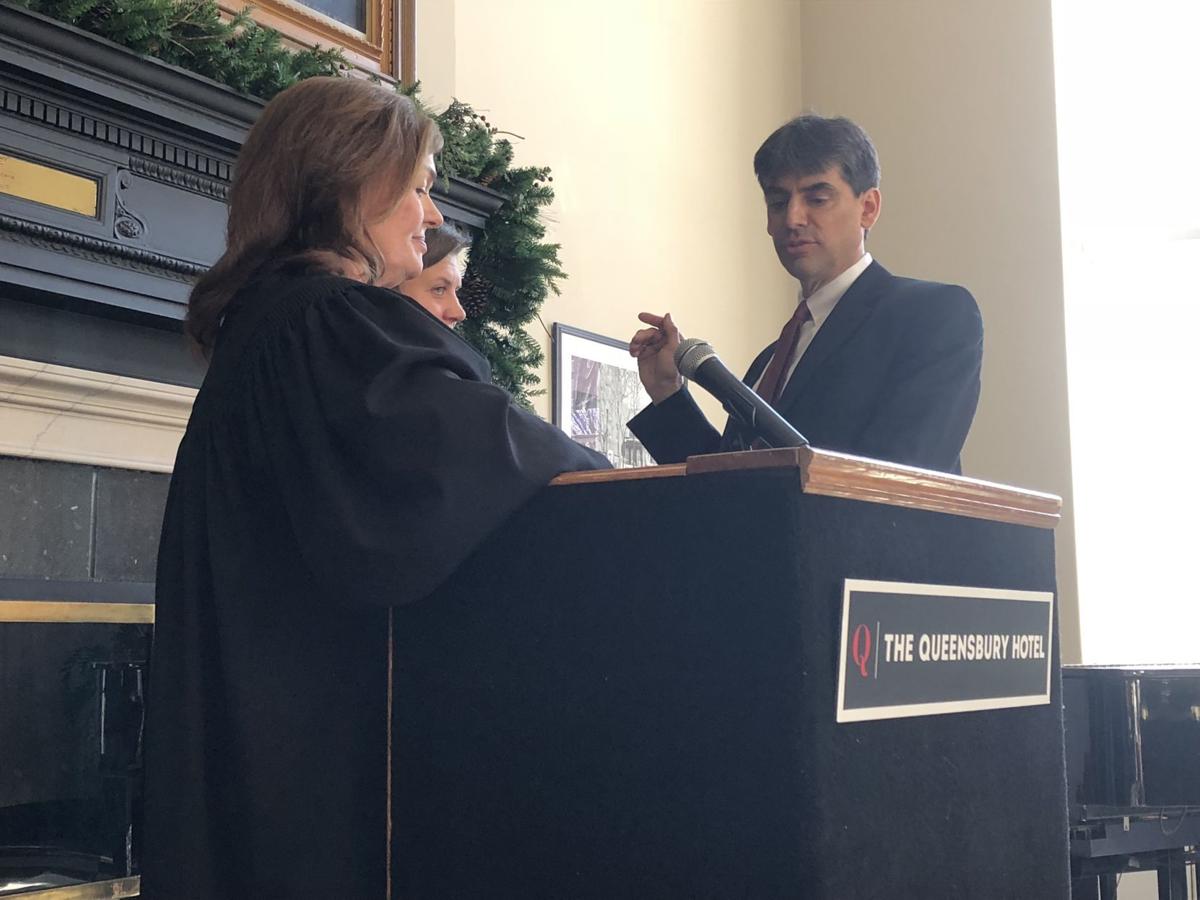 Carusone sworn in as DA amid accolades