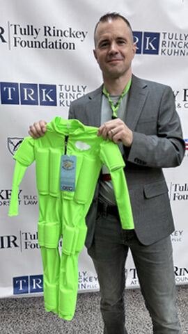 Swimsuit designed to train kids wins award as Veteran biz
