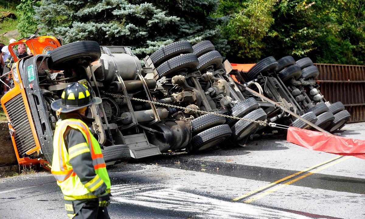 Man injured when tractor-trailer flips