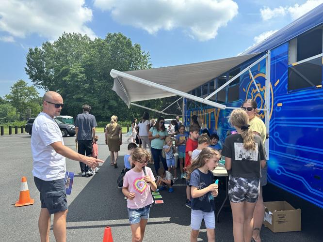 Queensbury’s Q-Munity bus begins summer tour at Hovey Pond Park