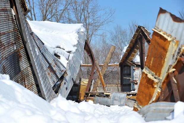 Weight of snow, ice collapses multiple barns