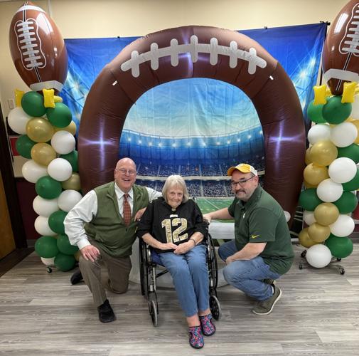 Greenjacks football team visits Warren Center seniors