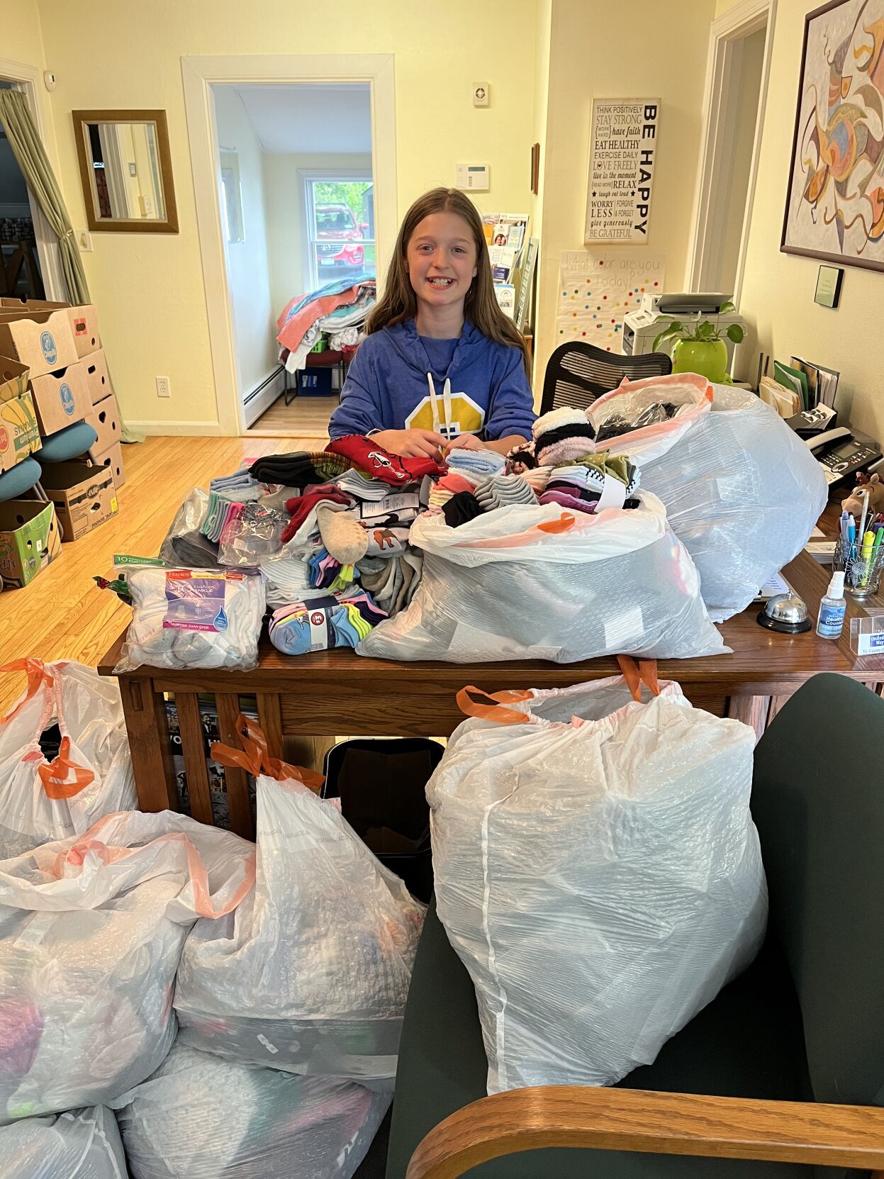 "Spartitude": Sock donation at Queensbury school to live on.