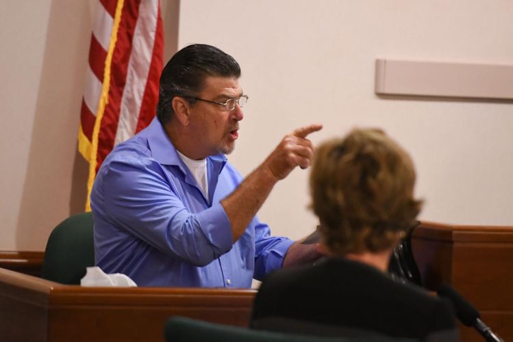 Slocum sentenced to 82 1/2 years to life in triple murder retrial