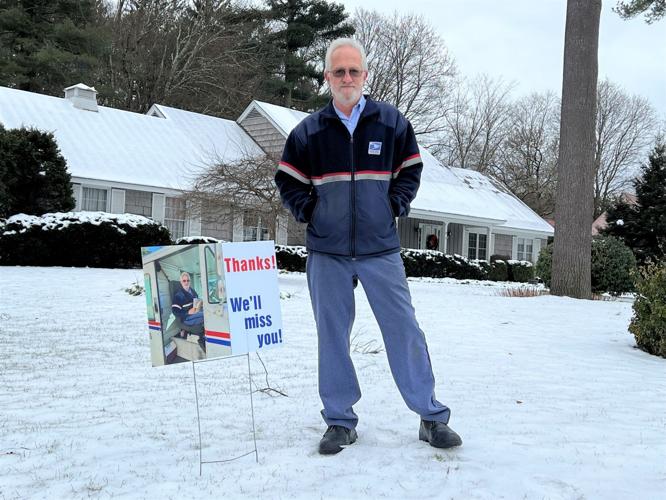 Residents say goodbye to mailman with lawn signs