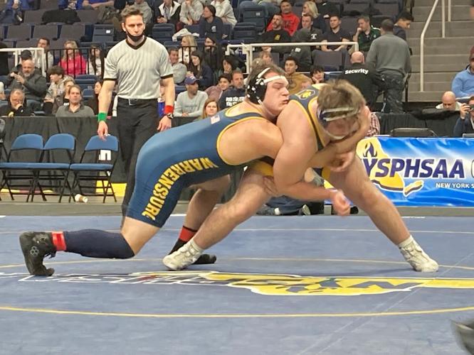 Schell, Hitchcock win state wrestling championship (includes video)