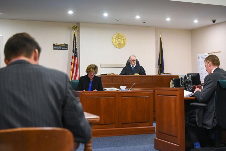 Slocum sentenced to 82 1/2 years to life in triple murder retrial