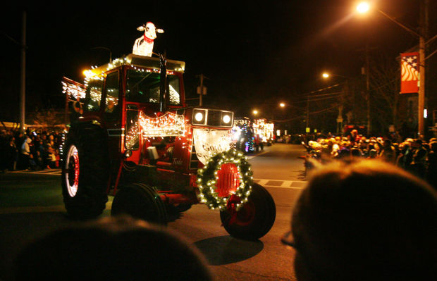 Tractors pull crowds into downtown Greenwich for lighted holiday parade