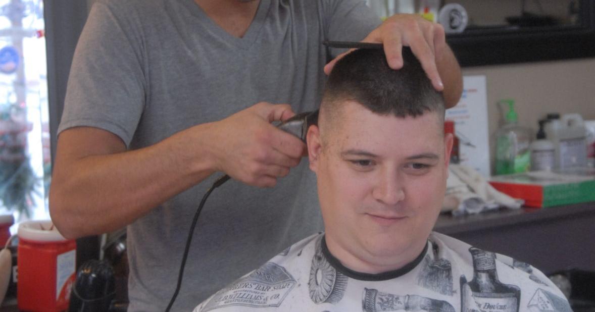 Barbers cut hair to benefit local firefighters