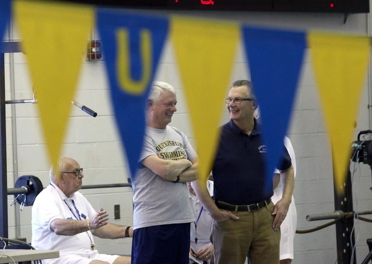 QHS swim coach prepares for retirement after 25 years