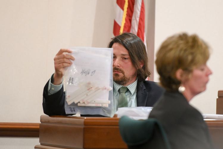 Slocum sentenced to 82 1/2 years to life in triple murder retrial