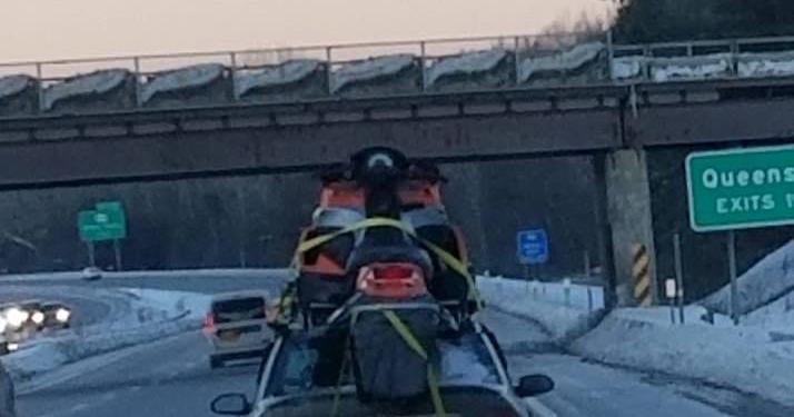 Snowmobile on car draws internet fame