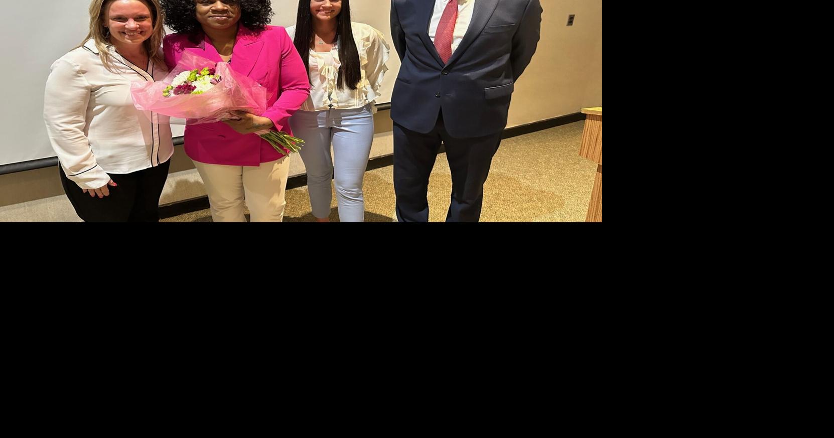 Warren county district attorney Jason Carusone confers honor