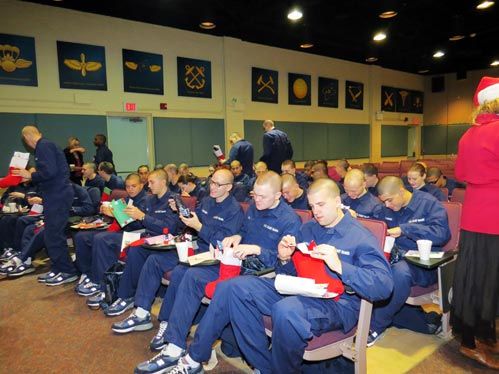 Coast Guard recruits receive holiday cheer in stockings
