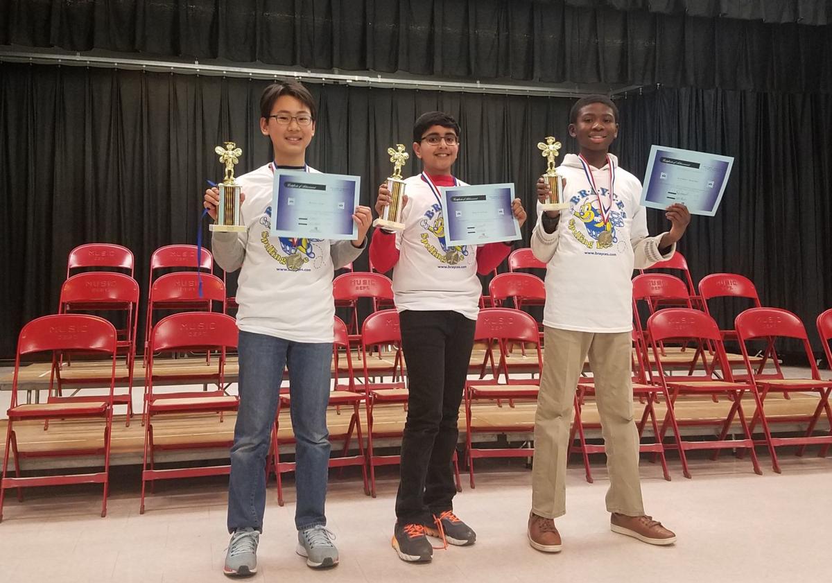 Roland Rogers in Galloway announces spelling bee winners