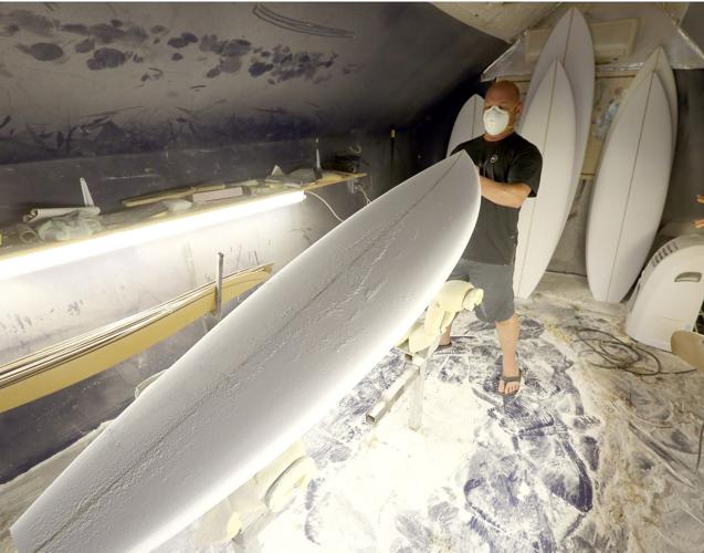 Local surfboard shapers create ocean works of art