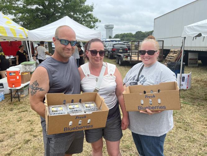 Rain doesn't stop annual Red, White, and Blueberry Festival