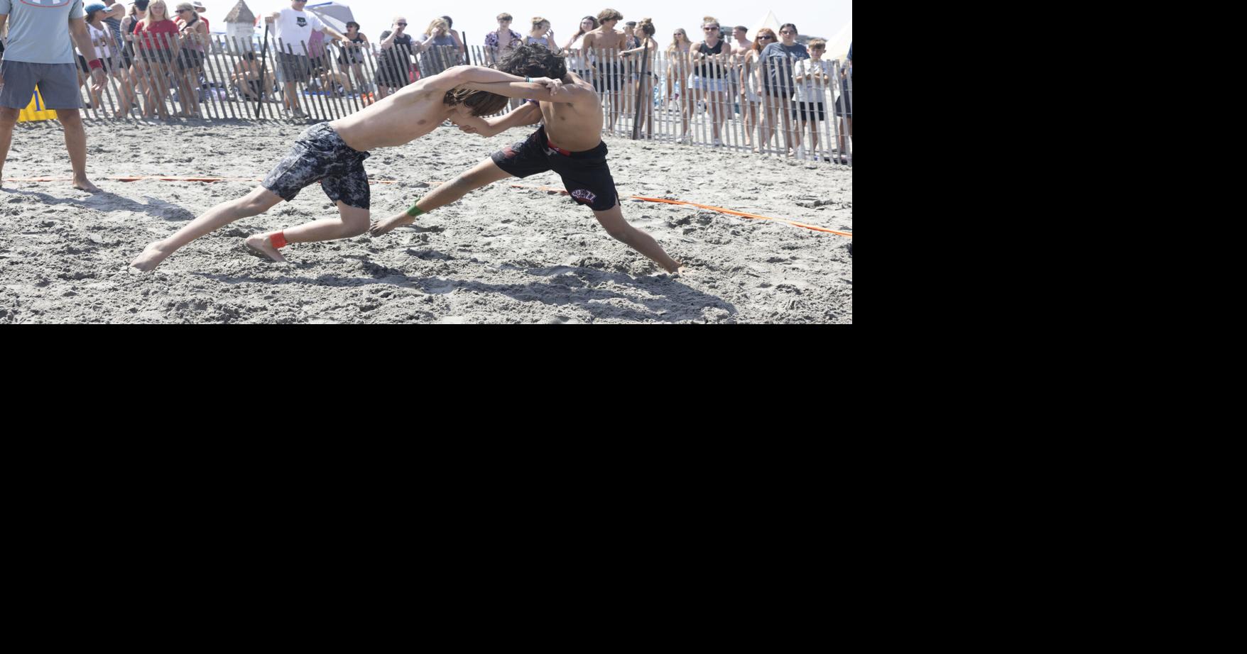 Sand in the eyes and mouth? That's still a perfect beach day for ...
