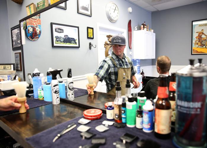 More people means more hair means more barbers