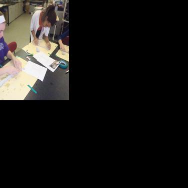 Students relate current genocides to Holocaust