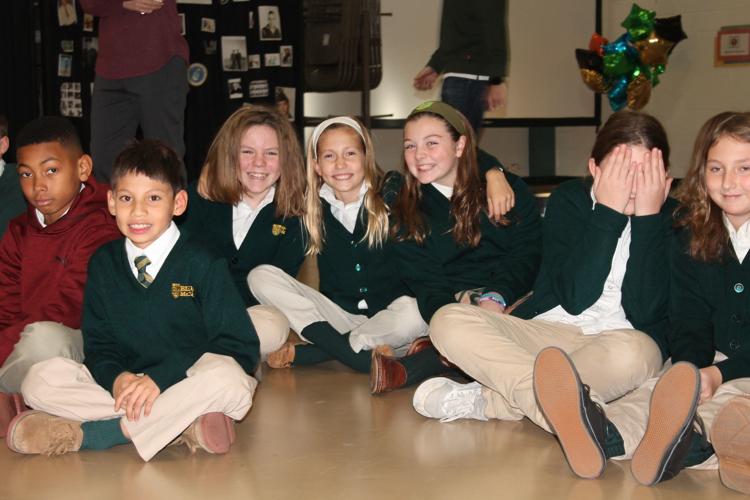 Bishop McHugh dedicates gym floor to former athletic director Lori Larkin