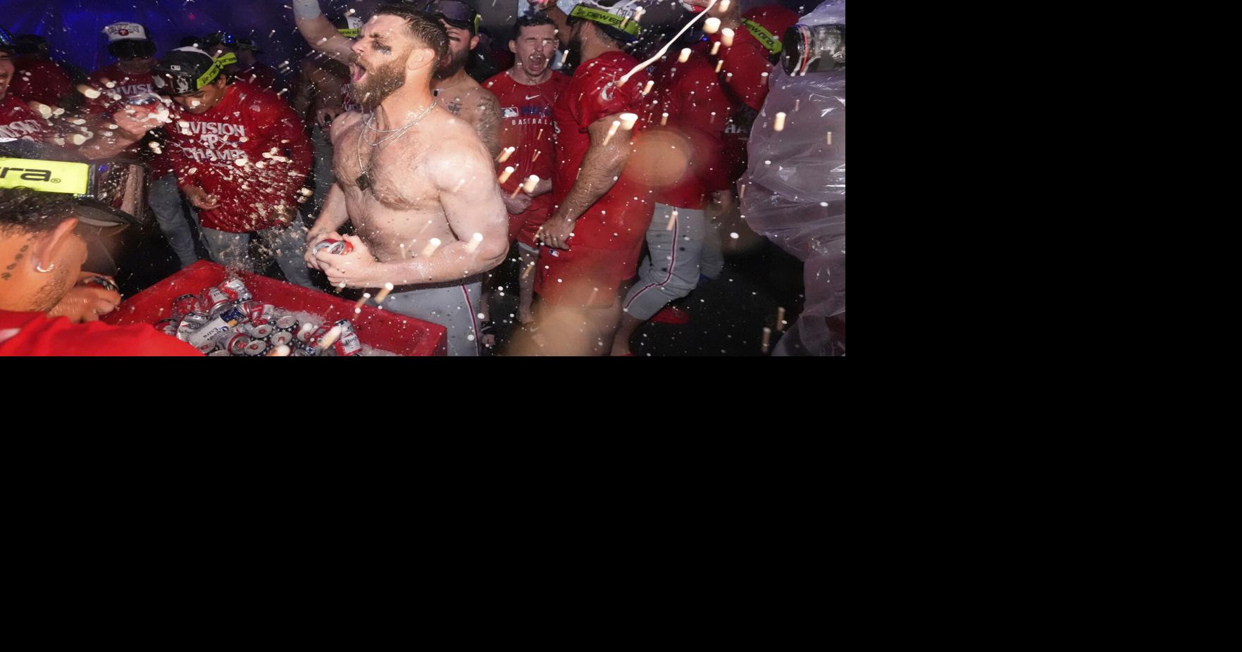 Fat cigars and chugging beer out of a hose: Phillies celebrate division ...