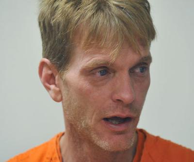 Man indicted on murder and weapons offense after turning himself in for ...