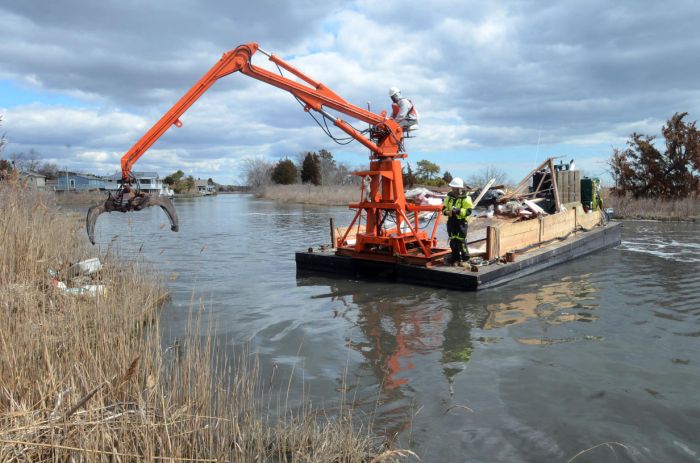 Contractors cleaning up hurricane debris in New Jersey coastal waters