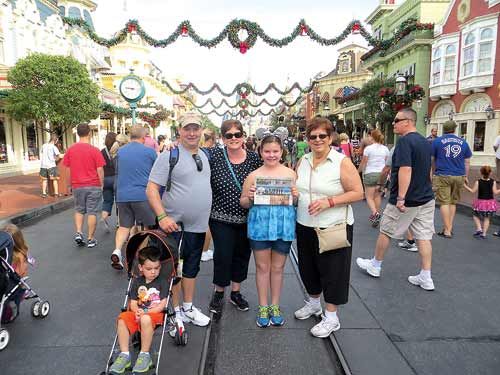 The Mora family took The Upper Township Gazette to Disney World