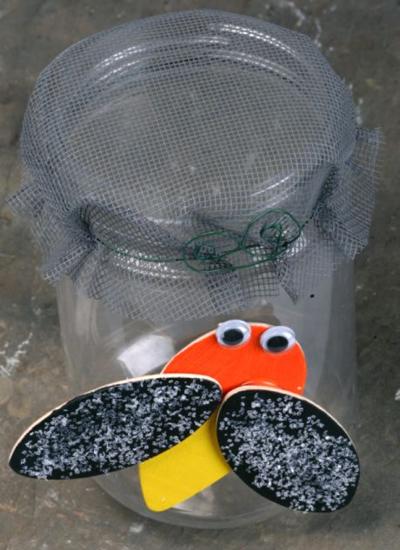 Enjoy the eerie glow of fireflies with a lightning bug catcher