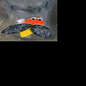 Enjoy the eerie glow of fireflies with a lightning bug catcher