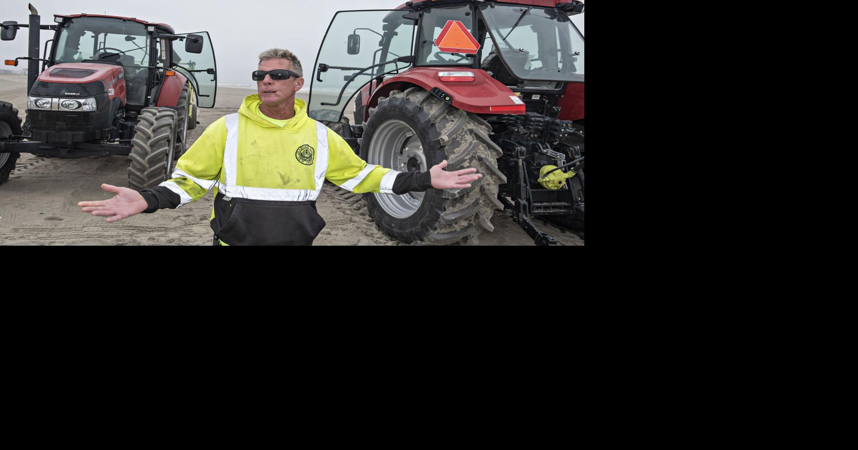Beach sweepers drive up, down, around to keep summer going smoothly
