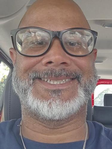 Tito Santiago is the new Holy Spirit softball coach