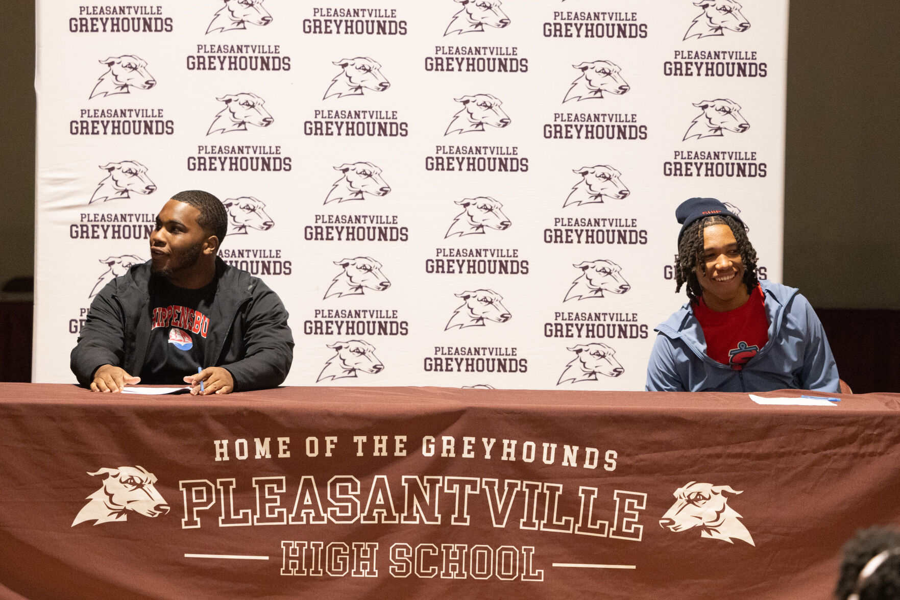 Local players sign during college football's early period