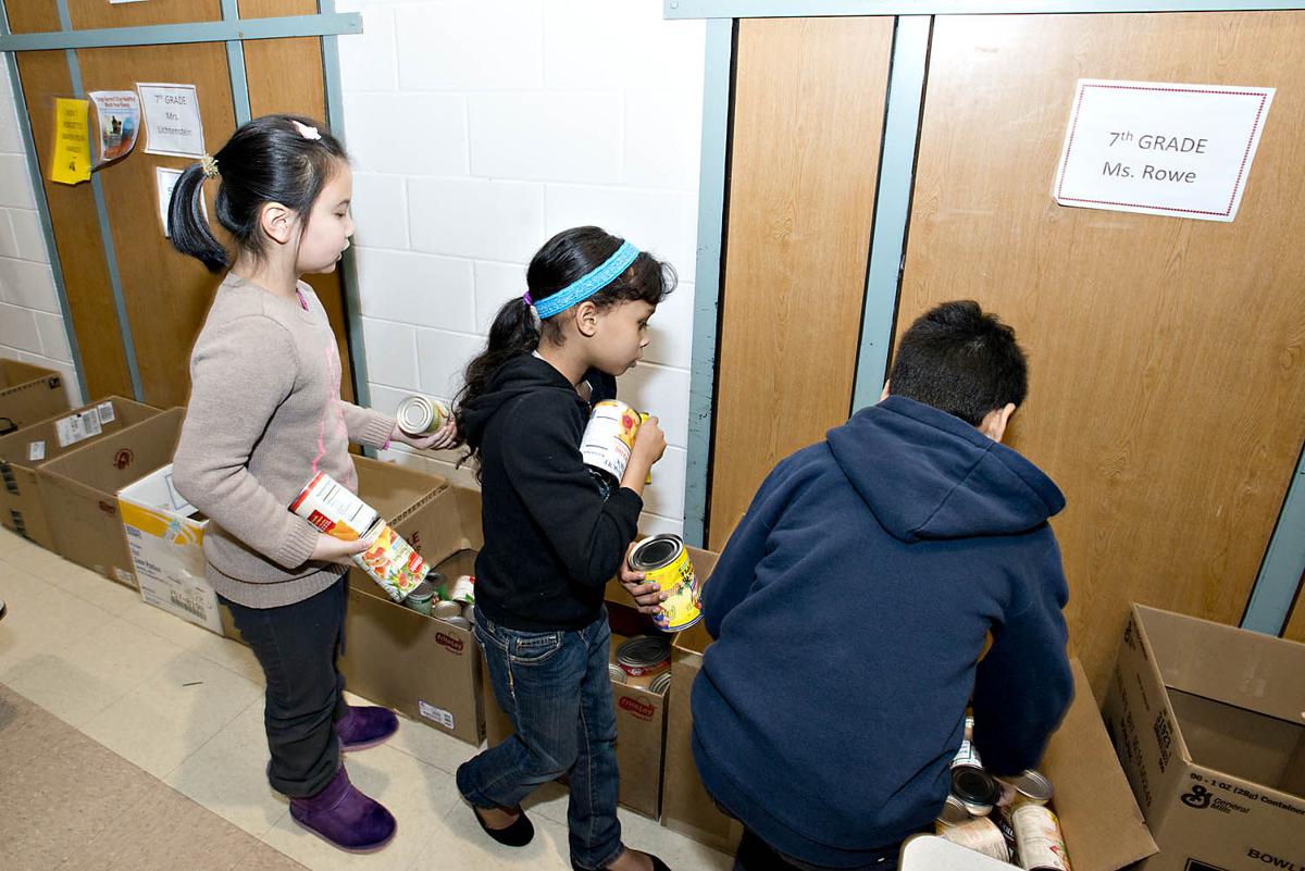 Charity begins at school for local students conducting food drives