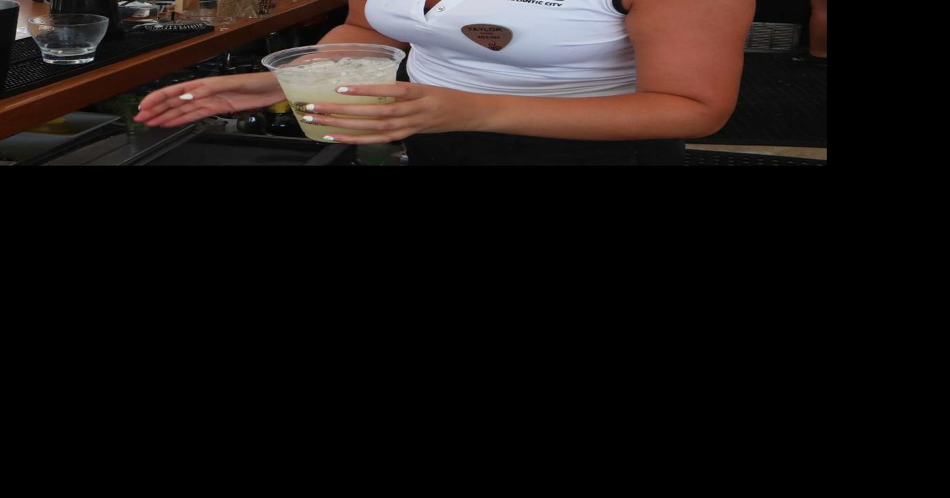 Beach bartenders beat the heat by serving up the cool side of summer