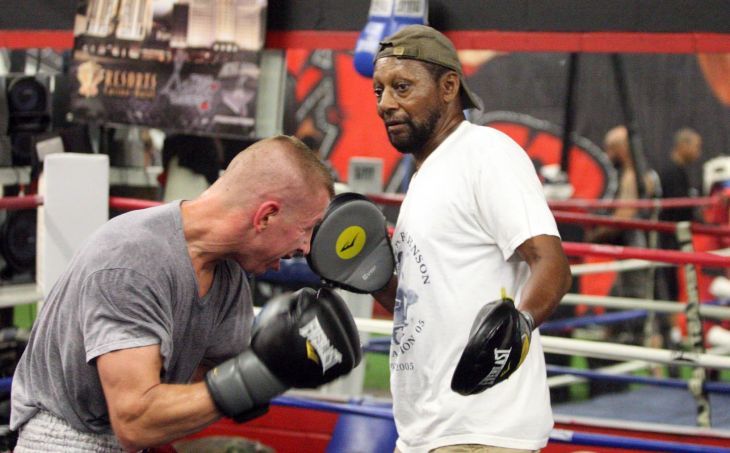 Trainer's enduring love for boxing overcomes grief of losing son