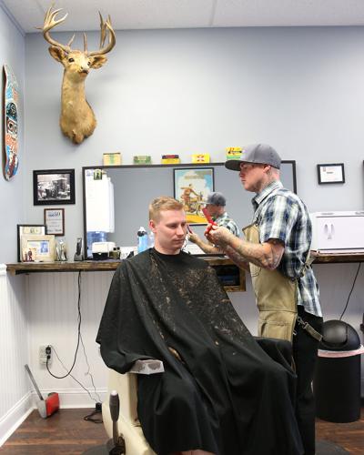 More people means more hair means more barbers
