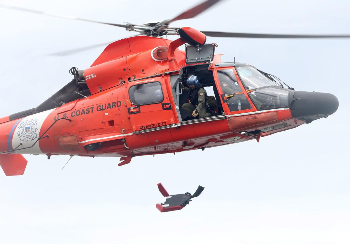 U.S. Coast Guard rescue swimmers act as paramedics in the water ...