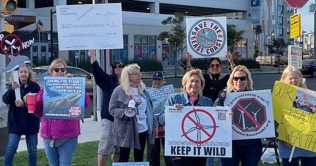 Celebration inside, protesters outside, at wind conference